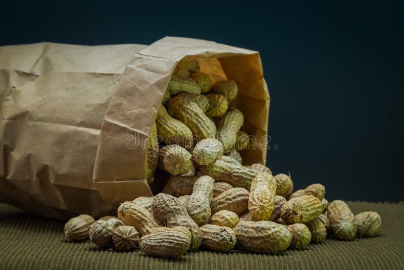 Spilled Brown Bag of Peanuts Stock Photo - Image of peanut, sack: 82068262