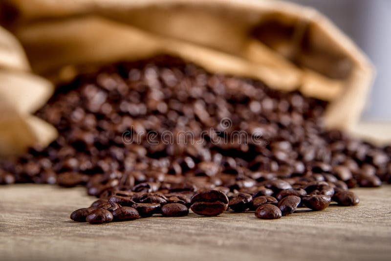 Spilled Coffee Beans on Wooden Stock Image - Image of objects, canvas ...