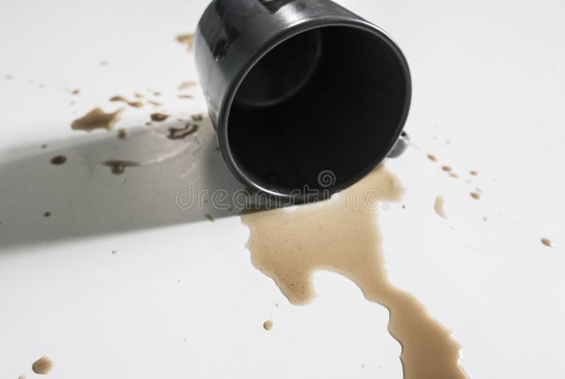 The Spilled Coffee from the Sloppy Glass is on the White Floor Stock ...