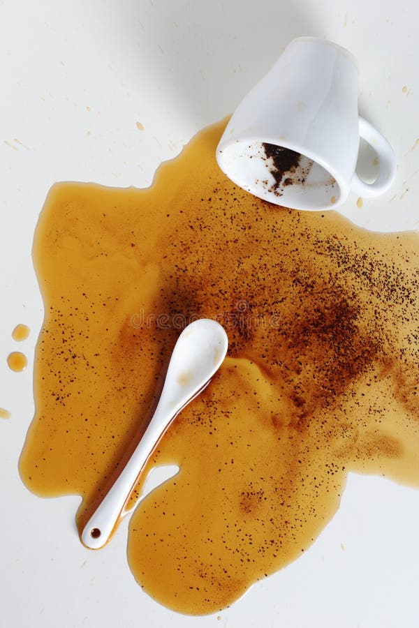 Spilled cup of coffee stock photo. Image of food, table - 221959066