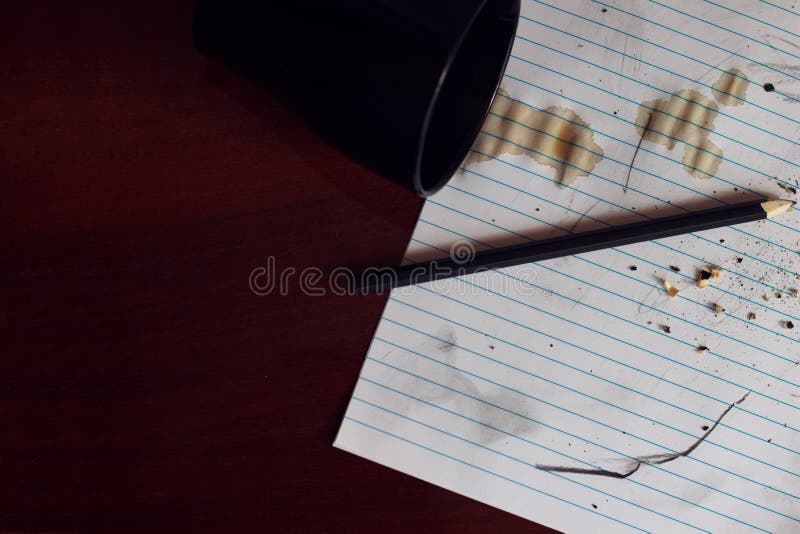 Spilled Coffee on Paper with Pipe, Lighter, Pencil and so on Stock ...