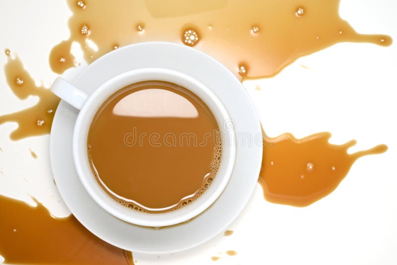 Coffee Cup with Spilled Coffee on Table Stock Photo - Image of coffee ...