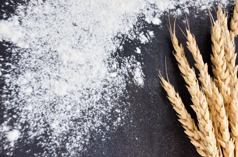 Spilled Flour and Wheat Ears on Black Background Stock Image - Image of ...