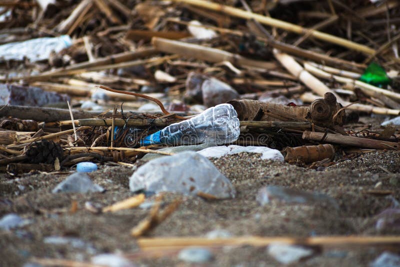 Spilled Garbage on the Beach.Empty Used Plastic Bottle Stock Image ...