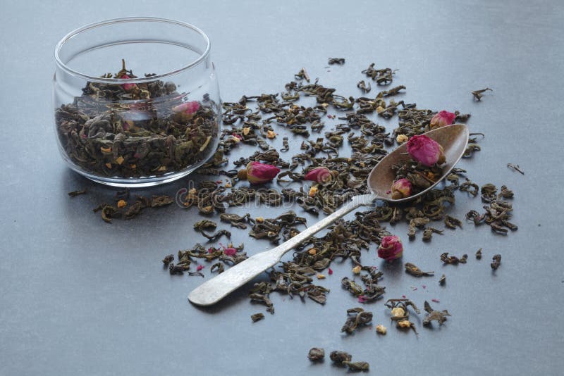 Spilled Green Tea with a Rose on Stone Table Stock Photo - Image of ...