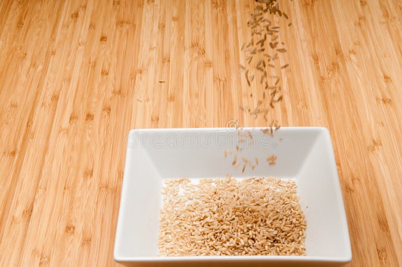 Spilled jar of rice stock image. Image of hunger, pour - 65793399