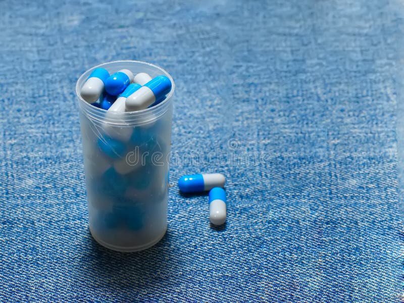 Spilled pills on the table stock image. Image of tablets - 122385467