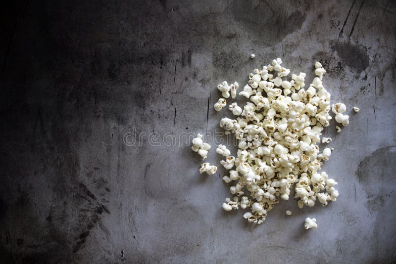 Spilled Popcorn with Room for Copy Stock Photo - Image of food, salty ...