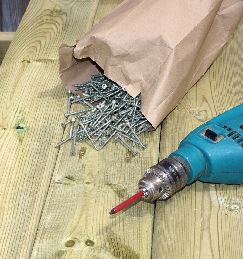 Spilled screws stock image. Image of board, screws, decking - 40651161