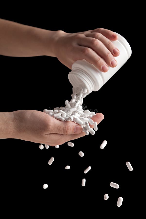Spilling vitamin pills stock image. Image of falling - 19281107
