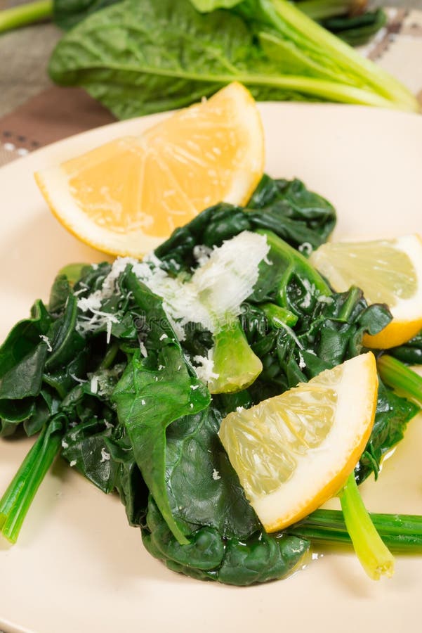 Spinach with lemon stock image. Image of nutrition, healthy - 55255407