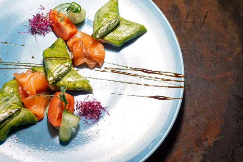 Spinach Pancakes Stuffed with Salmon Fish and Cheese Stock Image ...