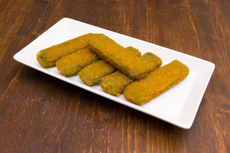 Spinach Sticks on a Tray on Wood Stock Photo - Image of dinner, fresh ...