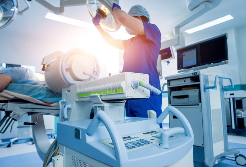 Spinal Surgery. Group of Surgeons in Operating Room with Surgery ... Spinal Surgery. Group of Surgeons in Operating Room with Surgery ...