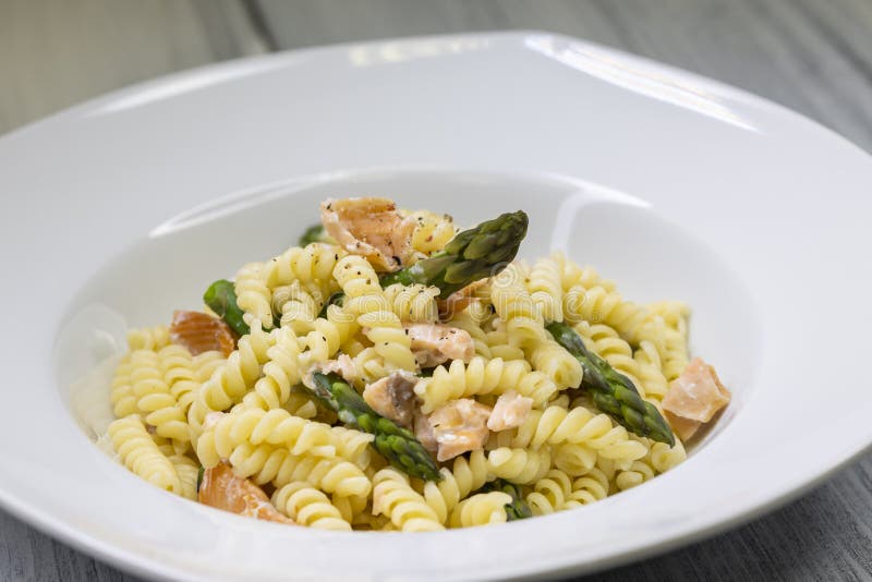 Spindle Pasta with Green Asparagus and Salmon Stock Image - Image of ...