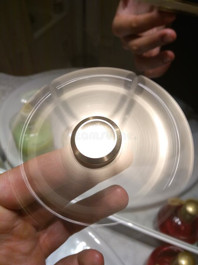 Spinner stock image. Image of metal, gold, spin, fast - 95719773