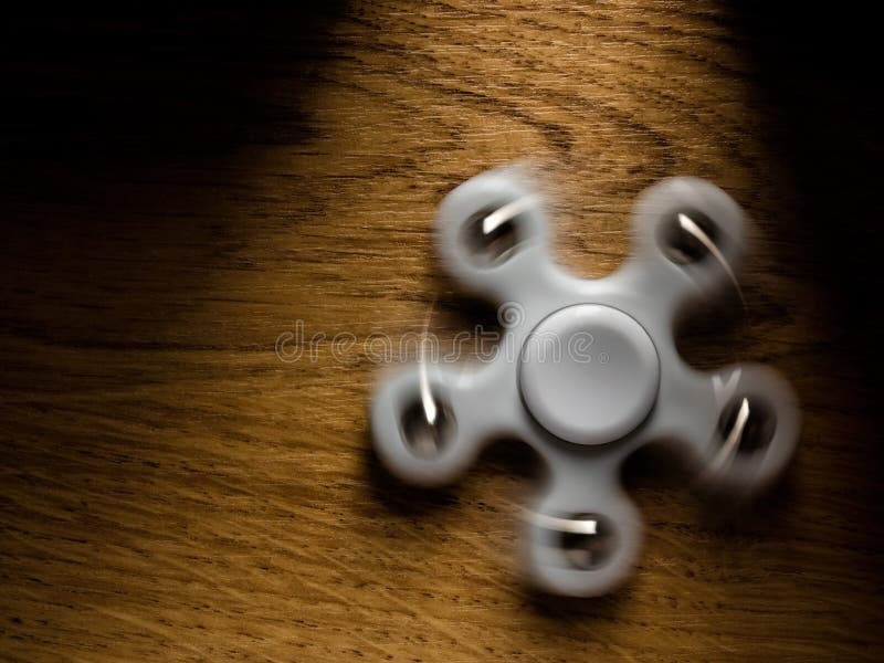 Spinner stock photo. Image of spinner, black, device - 116084260