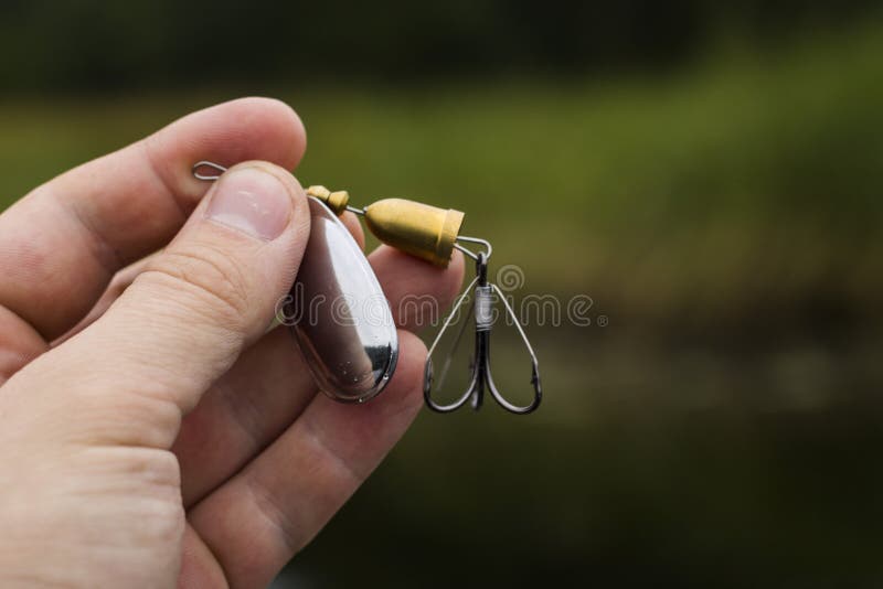 Spinner with a Triple Hook for Fishing Stock Photo - Image of triple ...
