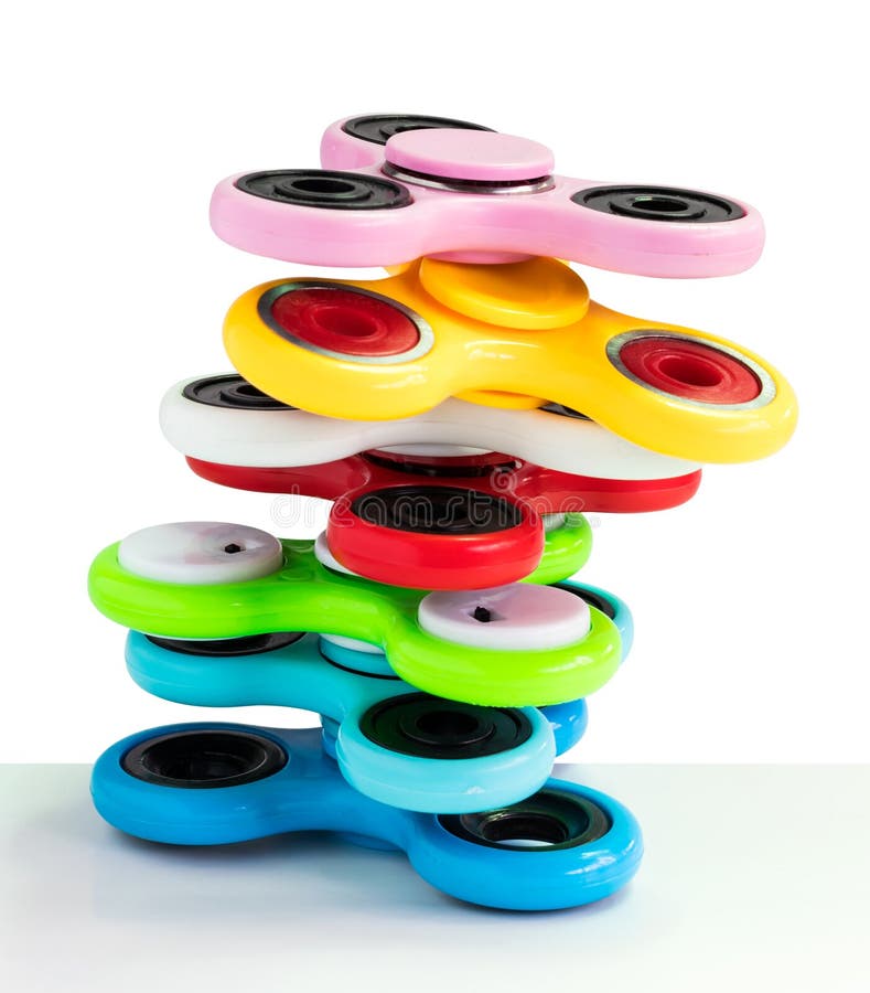 Spinners with a Variety of Colors Stacked. Stock Image - Image of ...