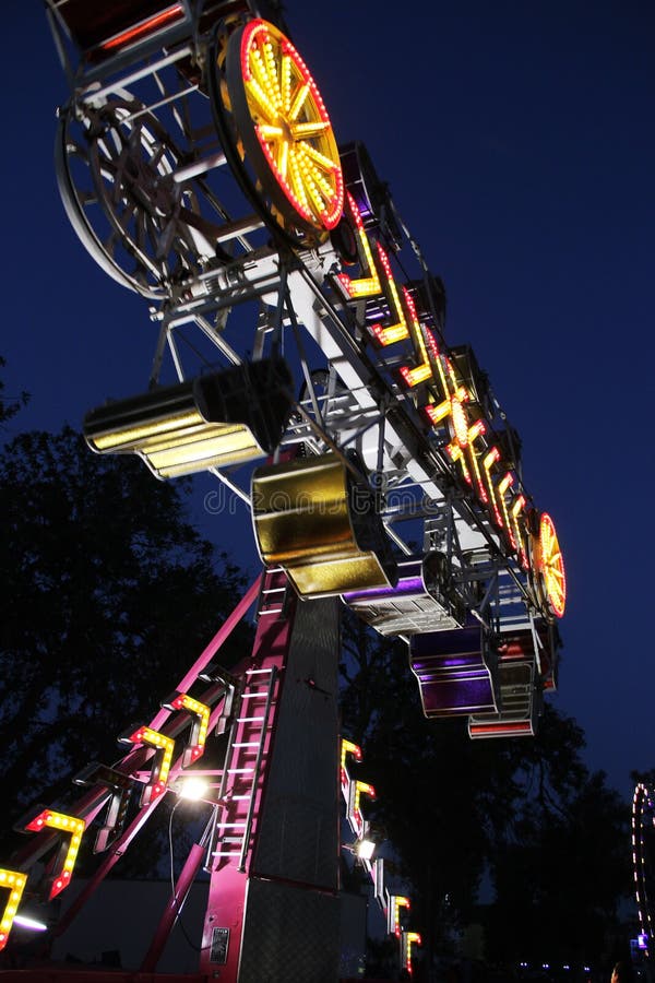 Spinning Carnival Ride stock image. Image of fair, yellow - 30647851