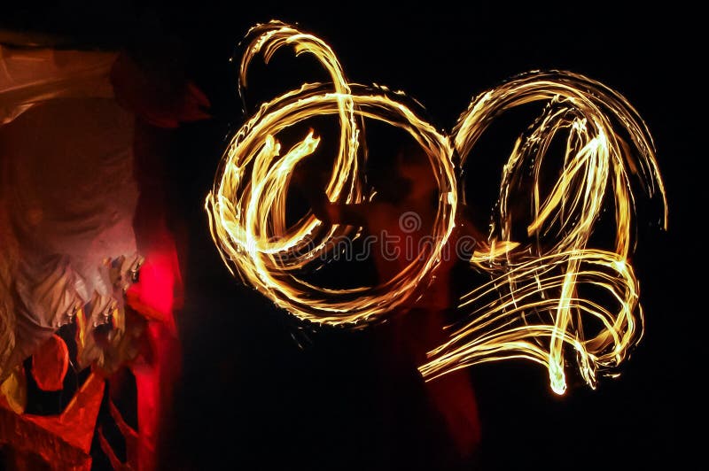 Spinning Fire Poi Rings of Fire Stock Photo - Image of artistic, light ...