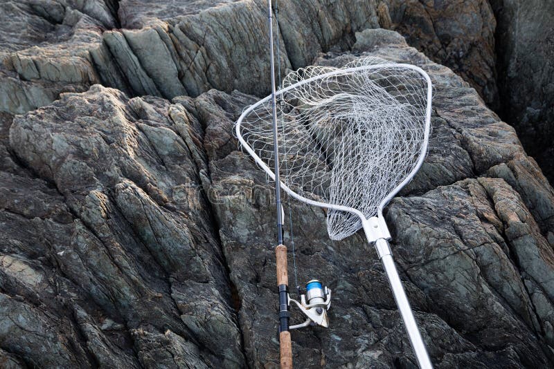 Spinning and Landing Net on a Rocky Sea Stock Image - Image of cell ...