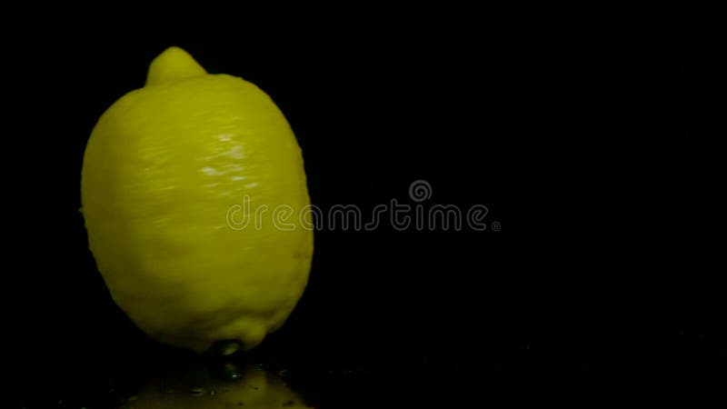 Spinning Lemon in Slow Motion on a Black Background Stock Footage ...
