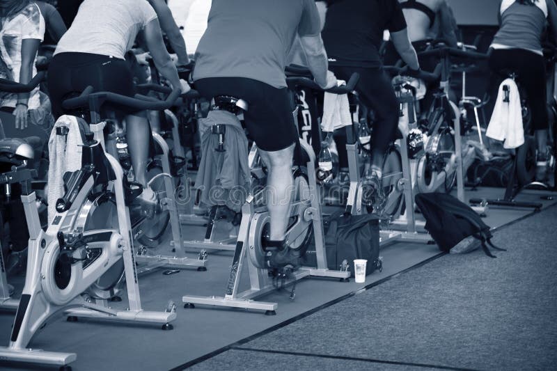 Man Cycling on Spinning Bike with Great Effort Stock Photo - Image of ...