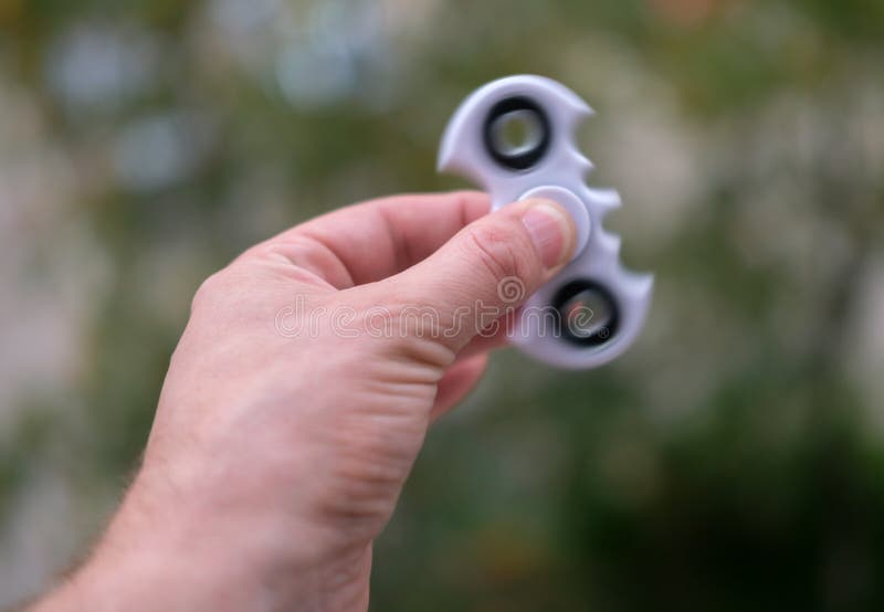 Spinning the Spinner in Hand Stock Photo - Image of game, childhood ...