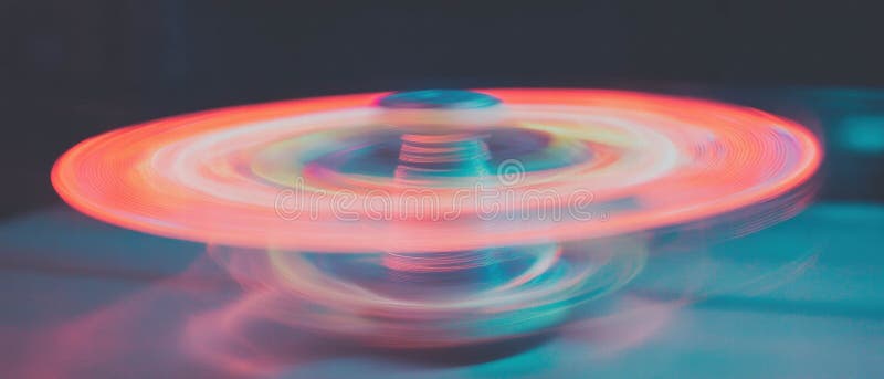 Spinning Top Creates Colorful Blurred Motion Effect with Long Exposure ...