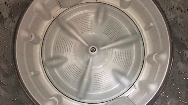 Spinning washing machine stock video. Video of machine - 138020781