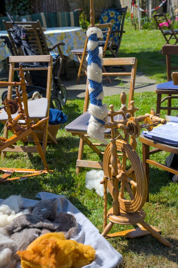 Spinning Wheel and Equipment on the Open Air. Yarn, Wool, Thread Stock ...