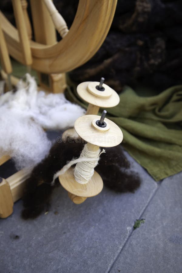 Spinning Wool on Spinning Wheel Stock Photo - Image of knitting, hands ...