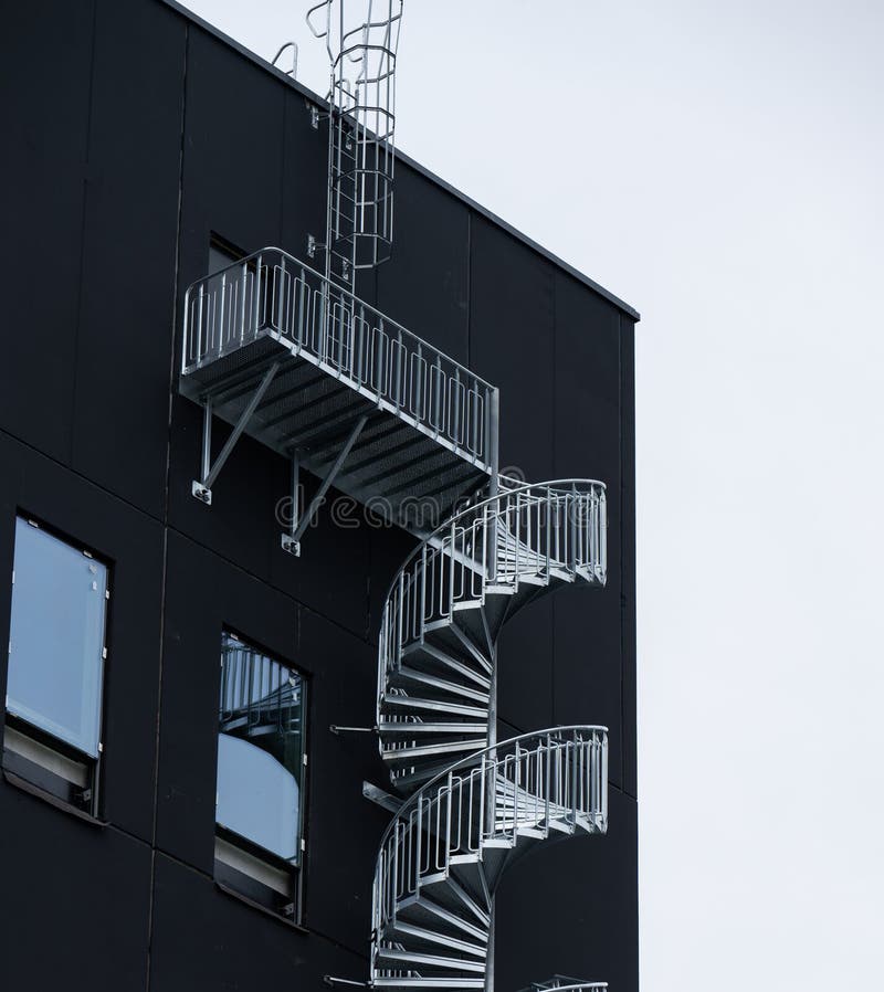 Spiral Emergency Stairs on the Side of a Warehouse.. Stock Image ...