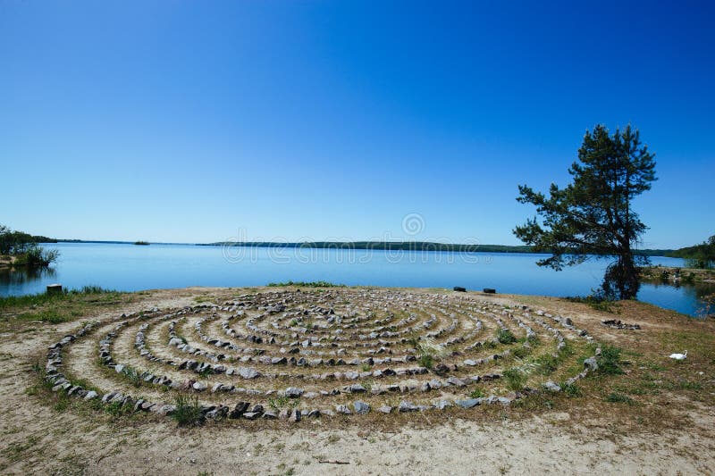 Spiral Labyrinth Made of Stones on the Coast Stock Photo - Image of ...