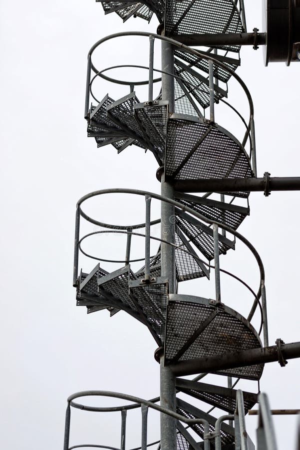 Spiral metal stairs. stock image. Image of railing, background - 91397831