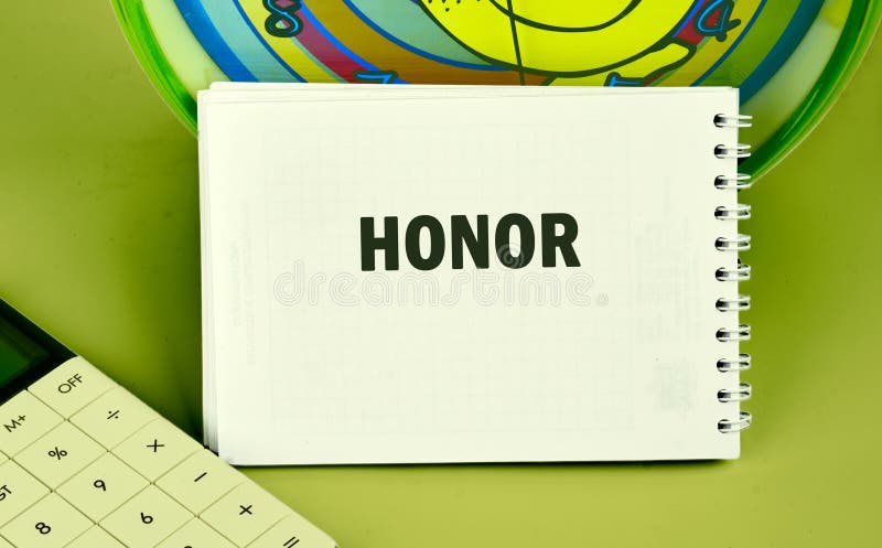 A Spiral Notebook Opened To the Word Honor is Placed Alongside a ...