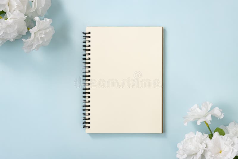 Spiral Notebook or Spring Notebook and Flowers at Top Left and Bottom ...