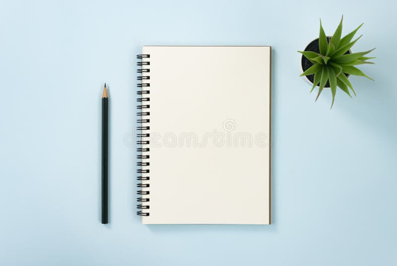 Spiral Notebook or Spring Notebook and Office Plant and Pencil on ...