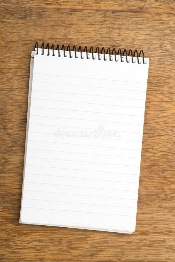 Spiral Notepad on Wooden Table Stock Image - Image of education ...