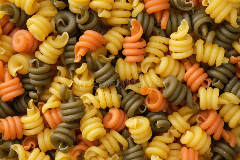 Spiral Pasta Background. Different Colored Pasta, Top View. Stock Photo ...