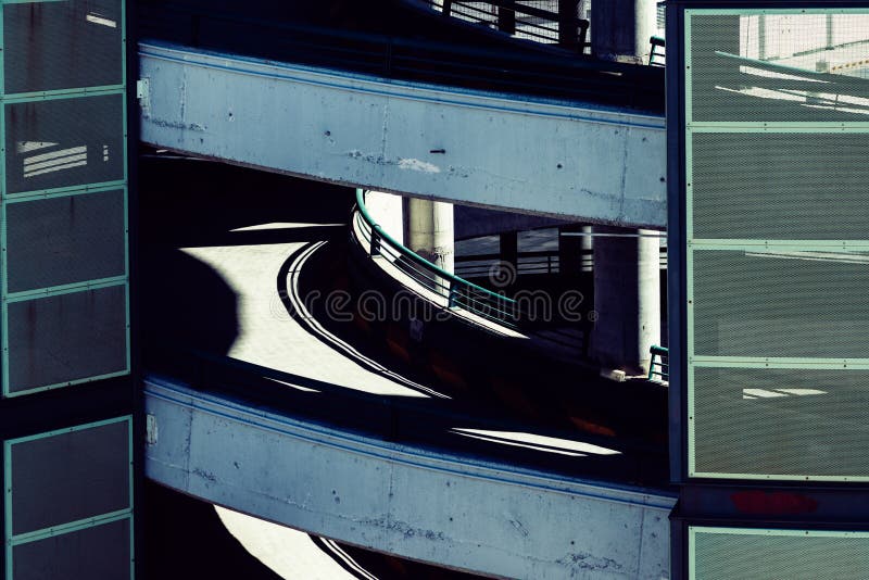 A Spiral Ramp in a Concrete Parking Garage. Stock Image - Image of ...