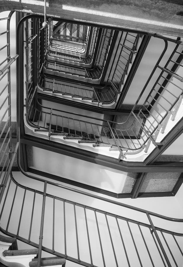 Spiral Rectangular Staircase with View from Bottom To Top. Black and ...