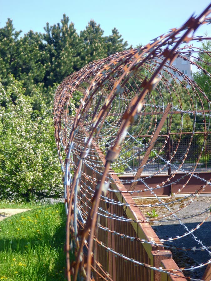Spiral of Sharp Rusty Barbed Wire Stock Photo - Image of fence, metal ...
