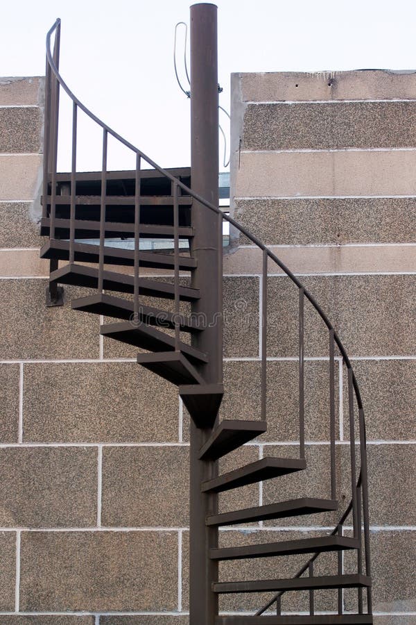 Spiral Staircase on a Rooftop Stock Image - Image of vertical, railing ...