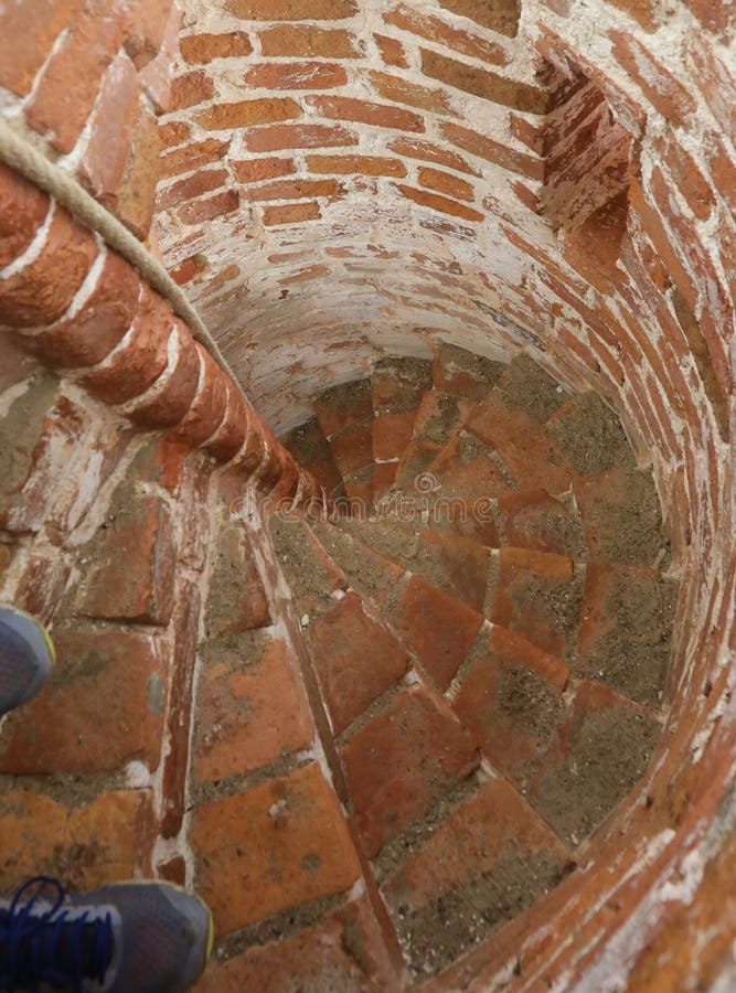 Spiral Staircase with Steep Steps Inside an Old Brick Tower Stock Photo ...