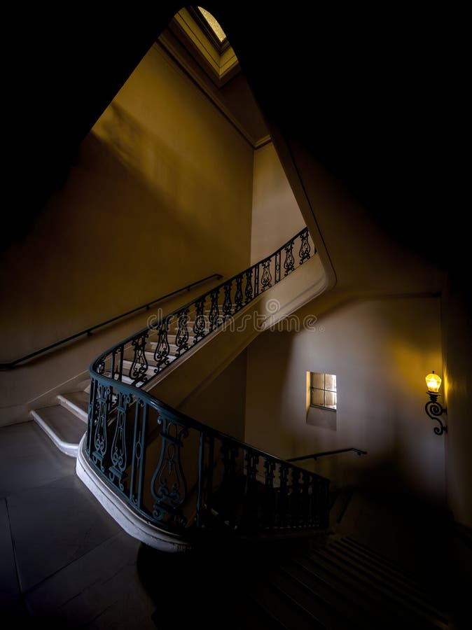 Spiral Staircase with Various Levels of Light in Vintage Setting Stock ...