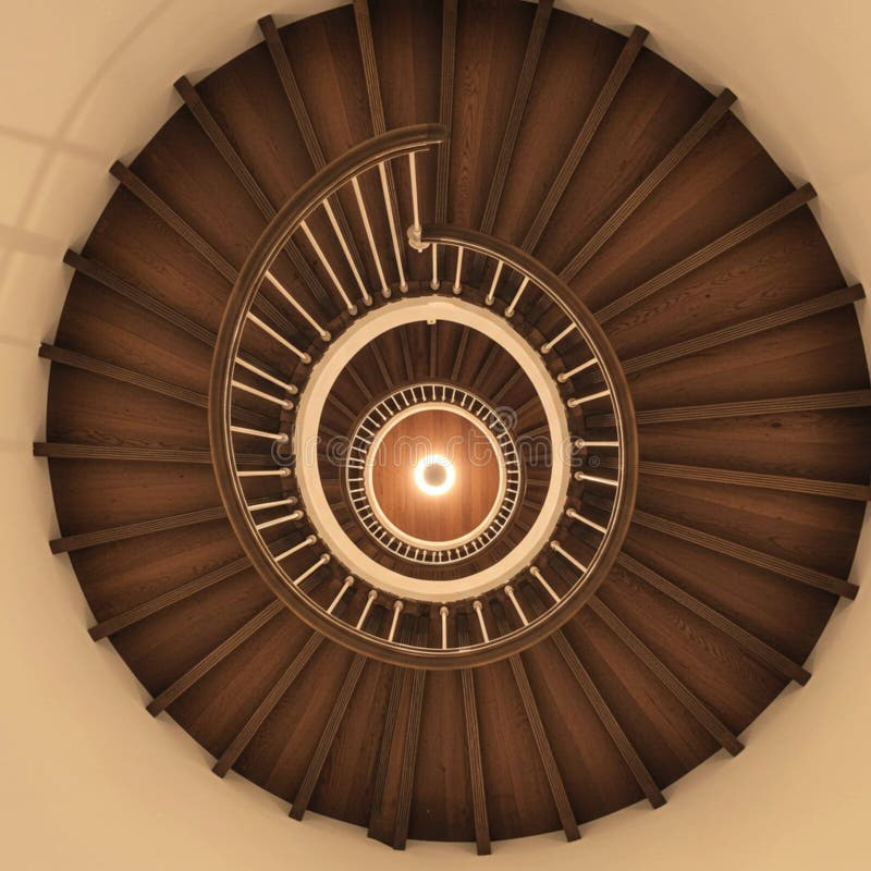 Spiral Staircase Viewed from Below, Showcasing a Stunning Geometric ...