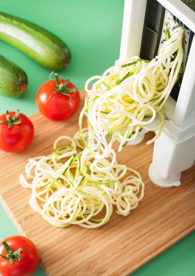 Spiralizing Courgette Raw Vegetable with Spiralizer Stock Photo - Image ...