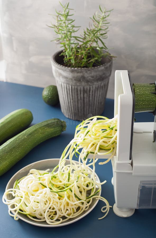 Spiralizing Courgette Raw Vegetable with Spiralizer Stock Photo - Image ...